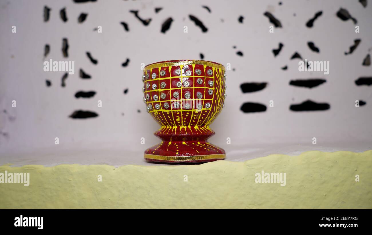 Beautiful marble Mortar holding in the window with red artificial ...