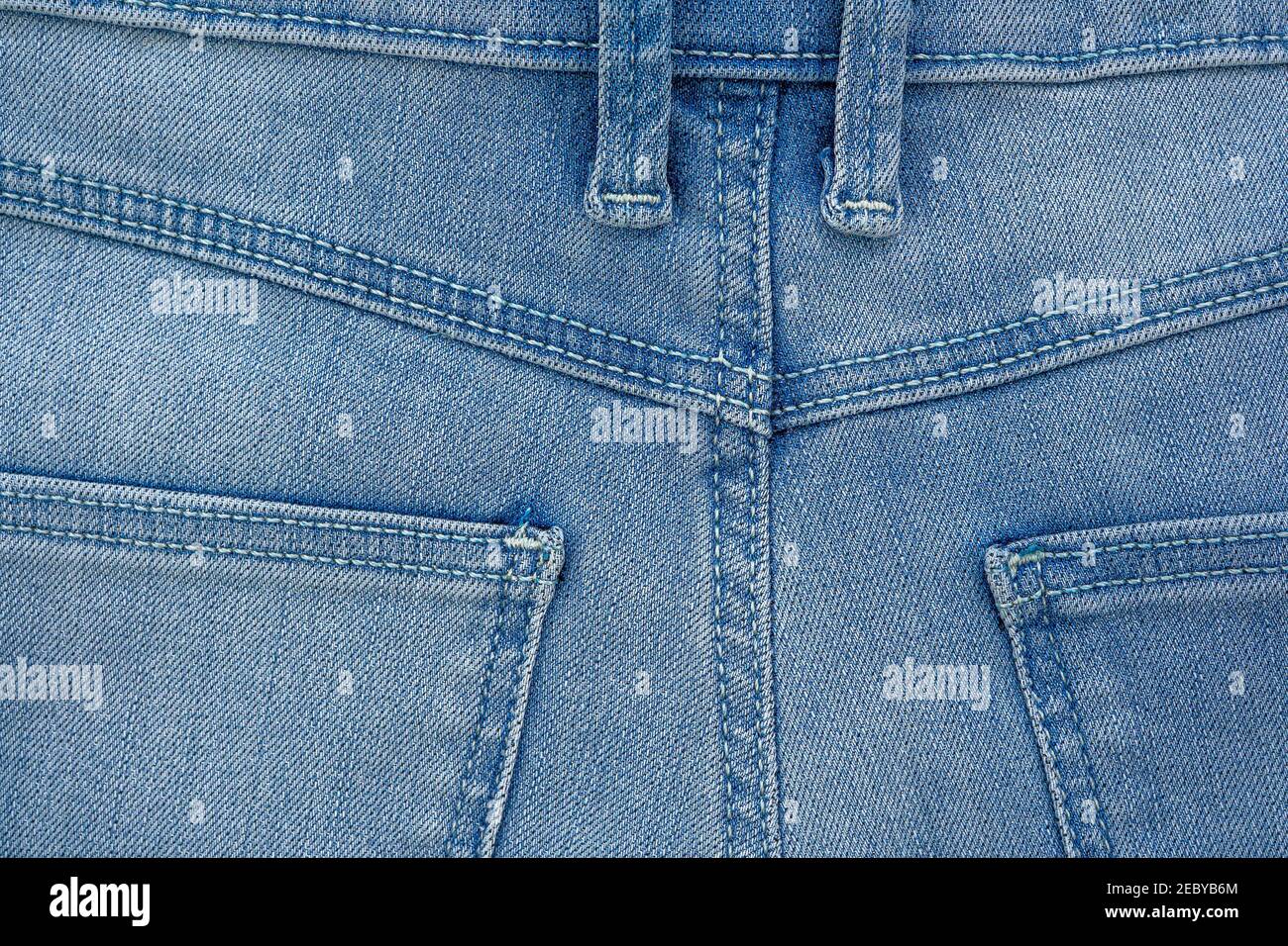Backside denim blue jeans pocket closeup. Denim jeans texture. Blue ...