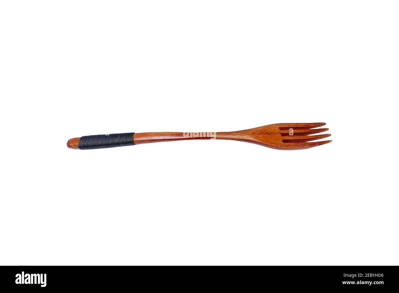 The wooden food fork isolated on white background. Cutlery and ...