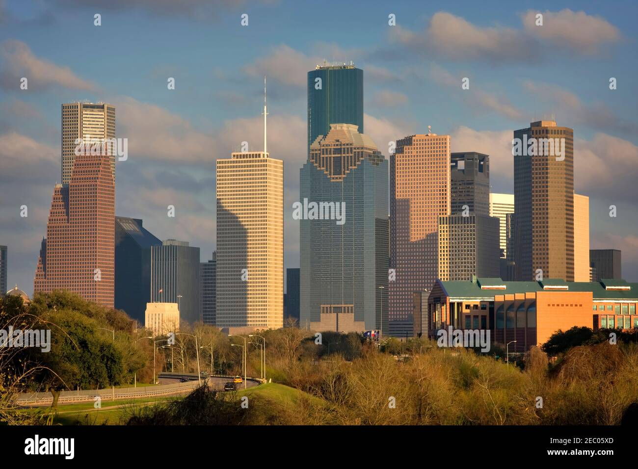 The skyline of downtown Houston with Memorial Drive on the left of the ...