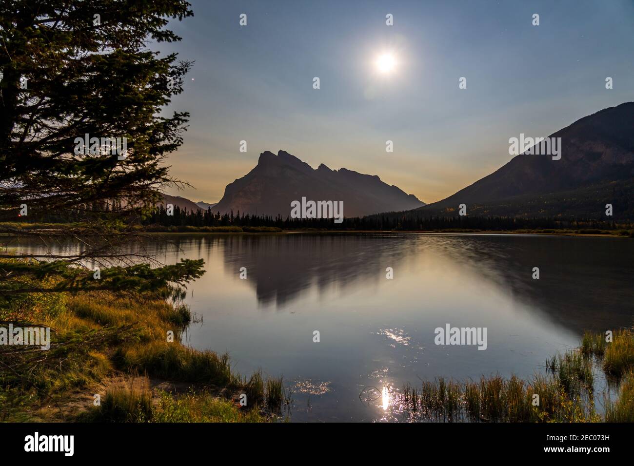Full moon over rocky mountains hi-res stock photography and images - Alamy