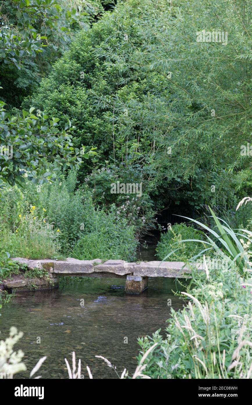 Old stone bridge across river eye in Upper Slaughter Stock Photo - Alamy