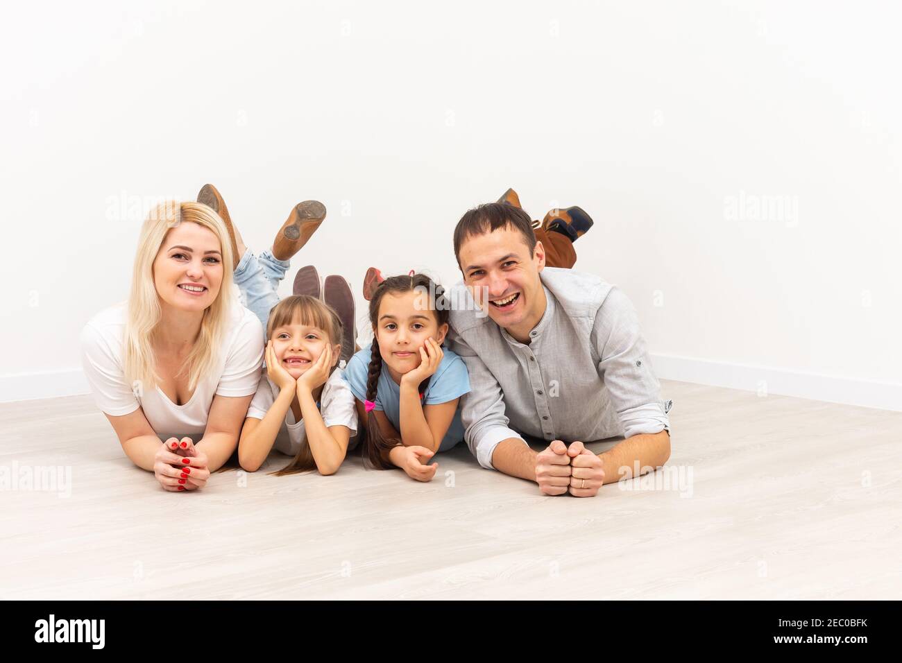 concept housing a young family. mother father and children in a new ...
