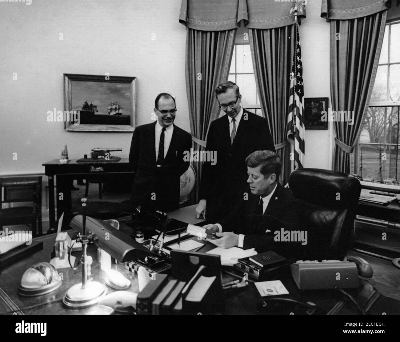 Signing ceremony, Economic Message. President John F. Kennedy (seated ...