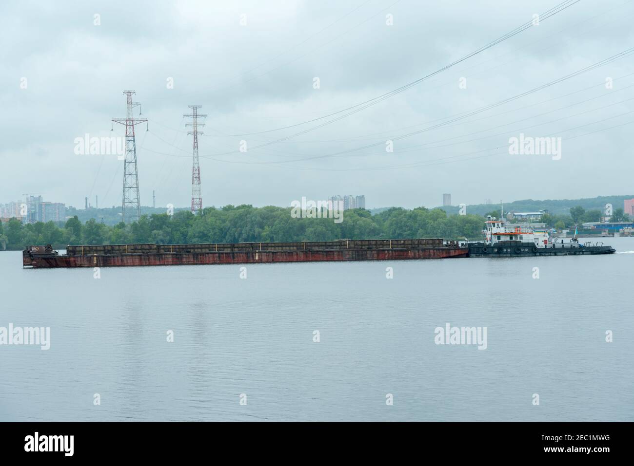 Beautiful barges from a height float on the river. The barge floats on ...