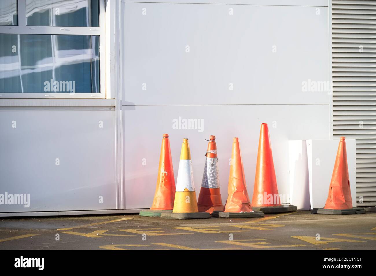 Red traffic cones at construction site plant room Stock Photo - Alamy