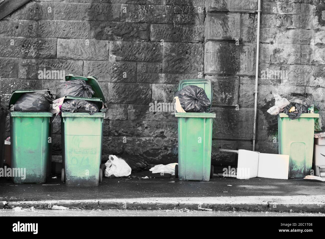 Fly tipping of waste and rubbish black bin bags in residential area ...