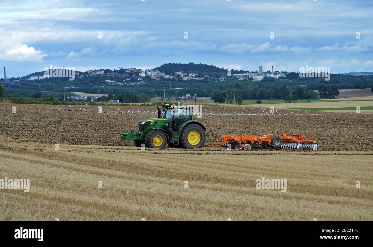 John Deere R Series tractor cultivating stubble, Benvie, Dundee ...