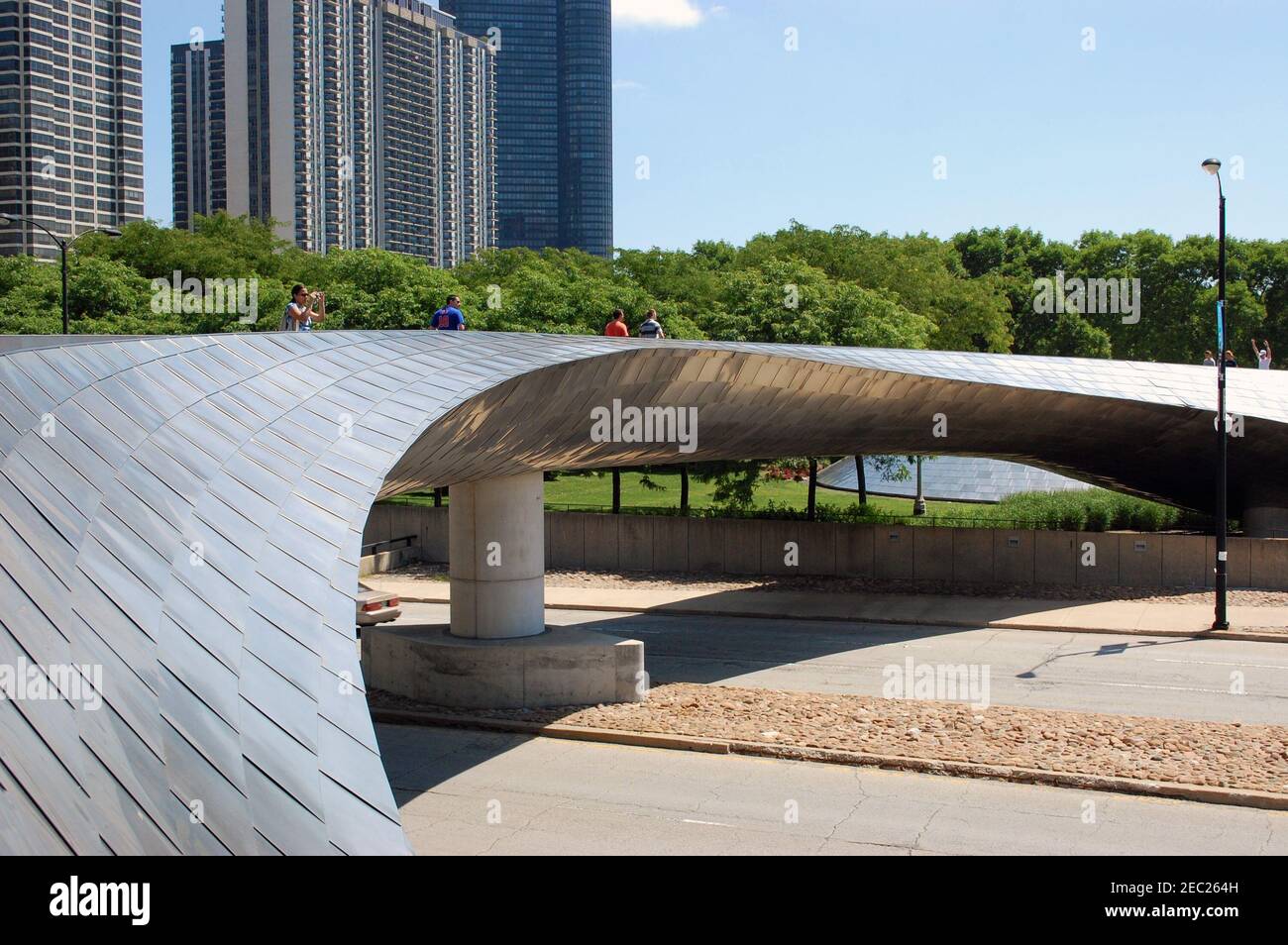 A footbridge called "BP Bridge" in Millennium Park, Chicago Stock Photo ...