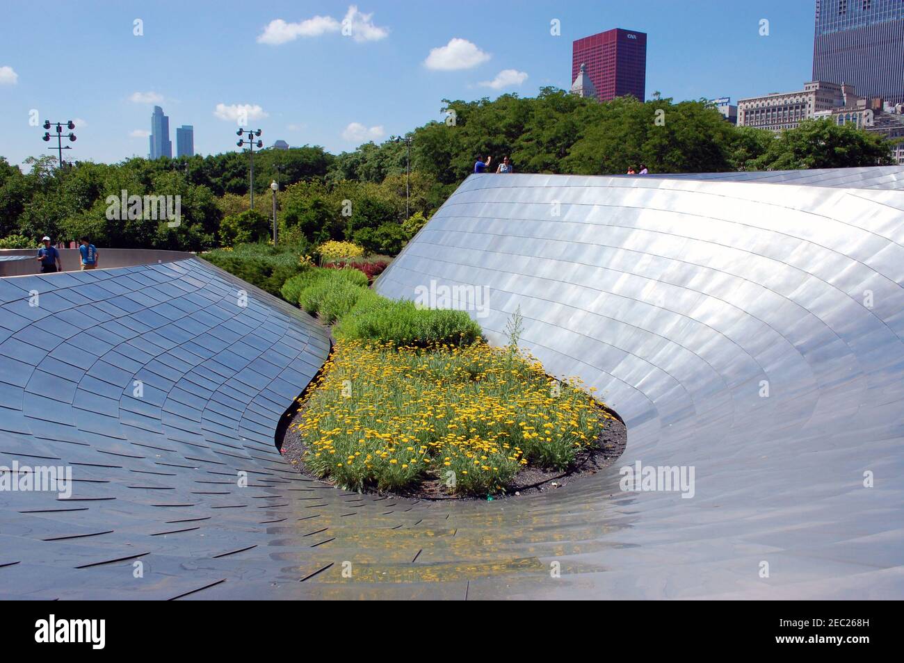 A footbridge called "BP Bridge" in Millennium Park, Chicago Stock Photo ...