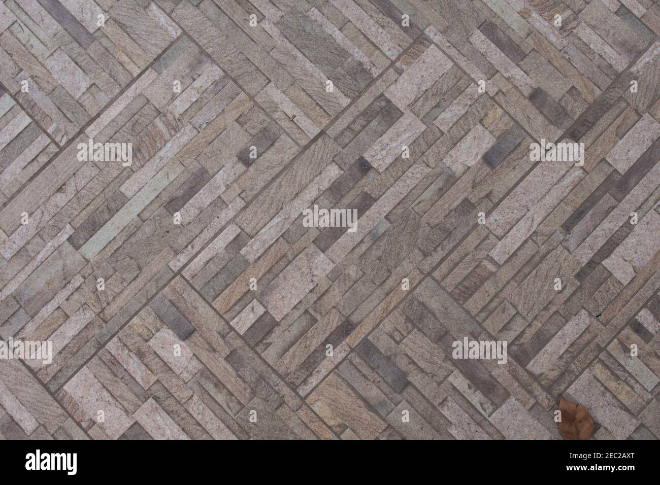 Stone paving texture with autumn leaf. Natural stone brick wall photo ...