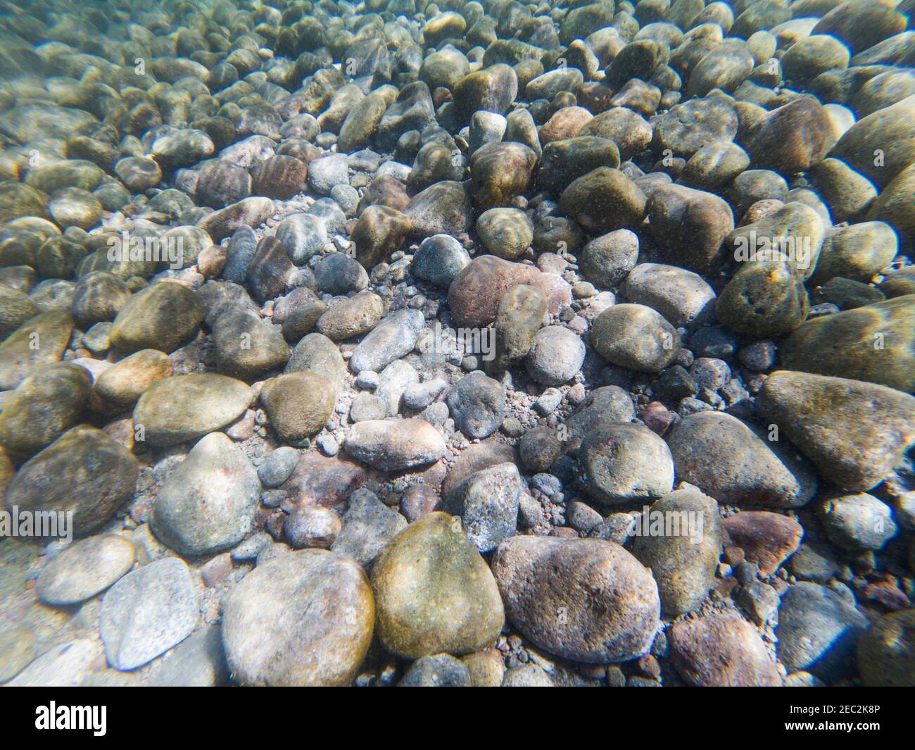 Seashore pebbles underwater photo texture. Seaside beach with smooth ...