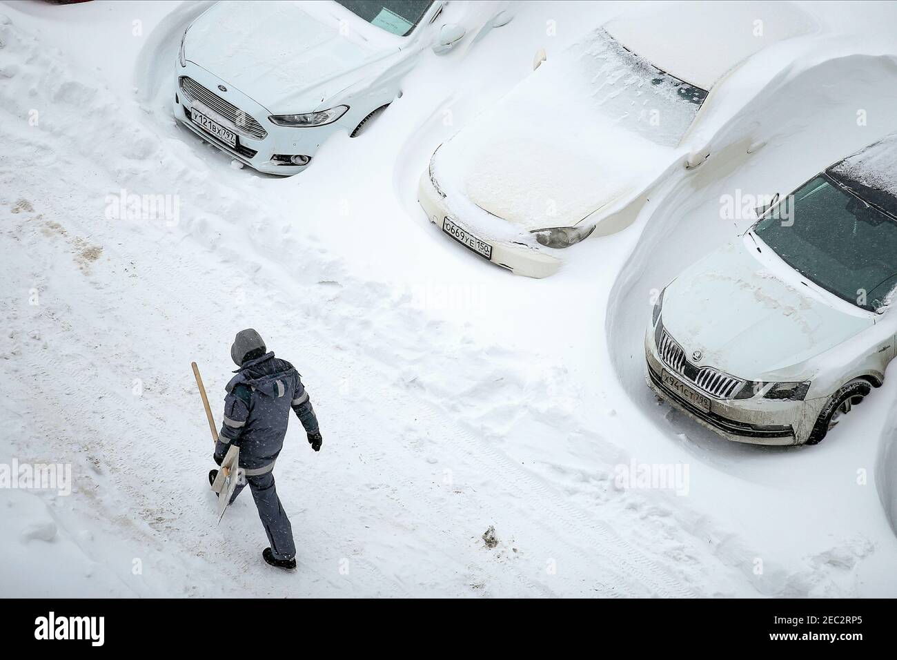 Heavy snowfall in Moscow, Russia. Car in traffic heavy snowfall Stock ...