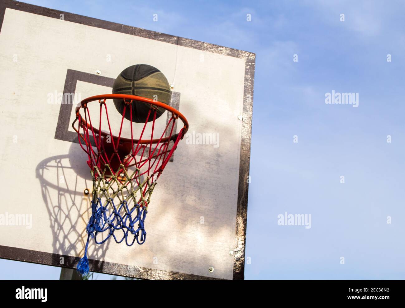 Basketball game outdoor equipment. Basket and ball. Accurate ball throw ...
