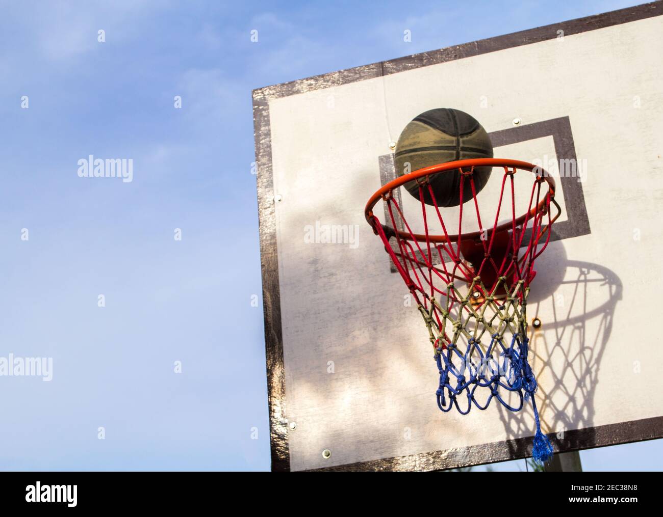 Basketball ring. Basket and ball. Accurate ball throw in basket. Street ...
