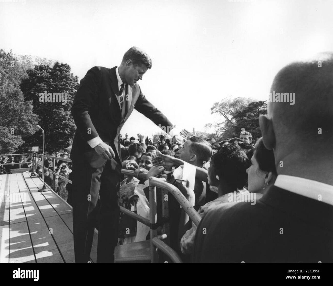 Attendees standing Black and White Stock Photos & Images - Alamy