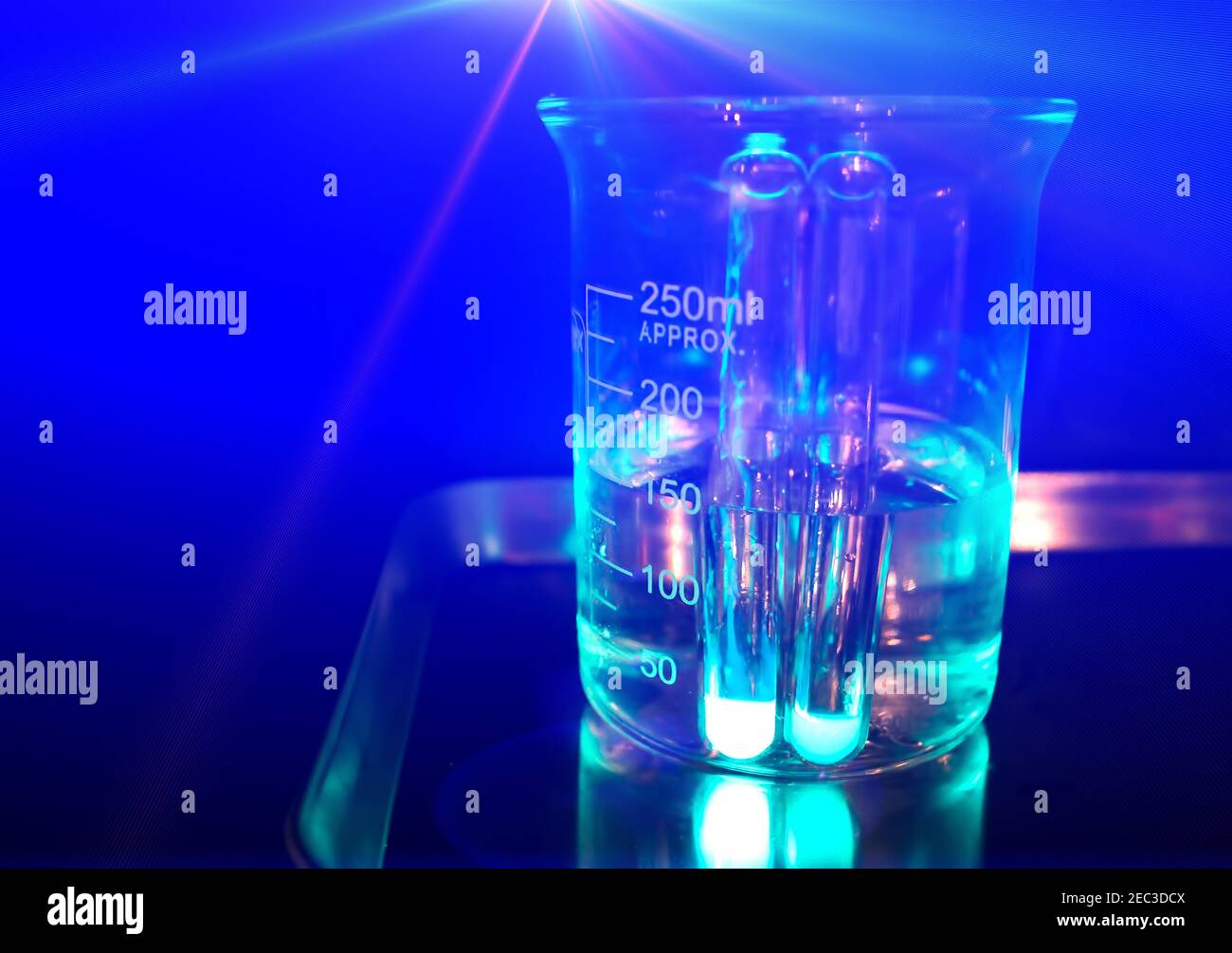 Laboratory beaker filled green color hi-res stock photography and ...