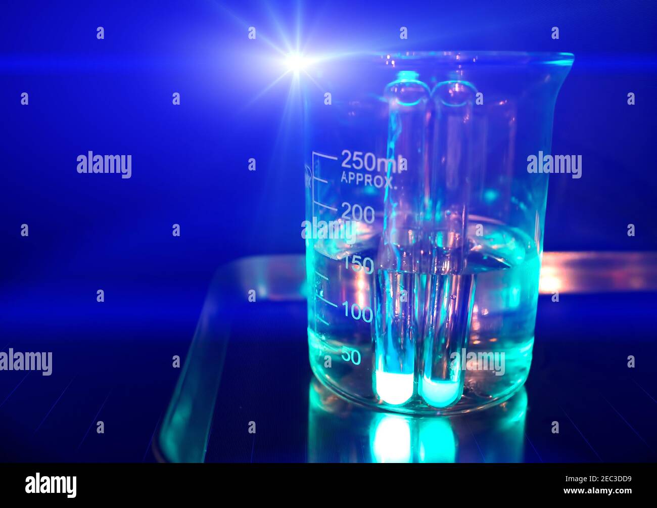 Chemical experiment glass beaker. Glass flask filled with transparent ...