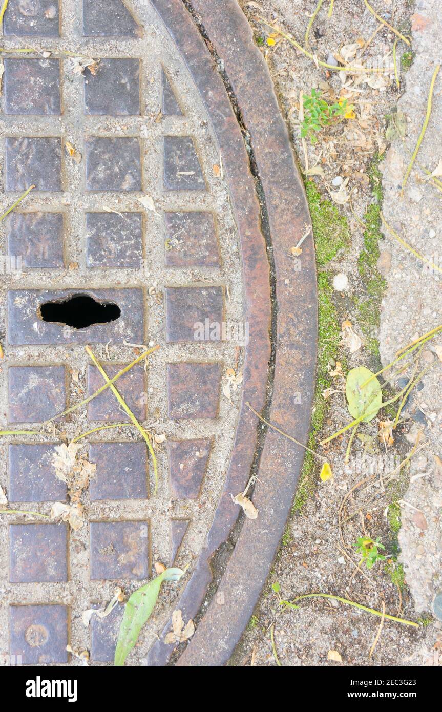 Vertical top view of a manhole cover Stock Photo - Alamy