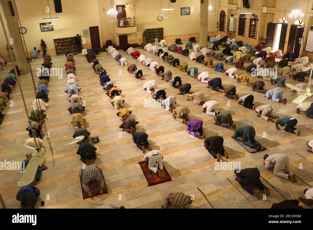 Muslim faithful wearing facemasks and maintained social distance as ...
