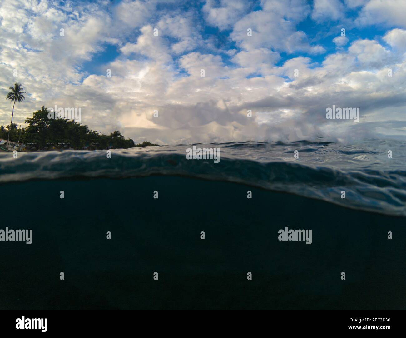 Double landscape with sea and sky. Above and below waterline in ...