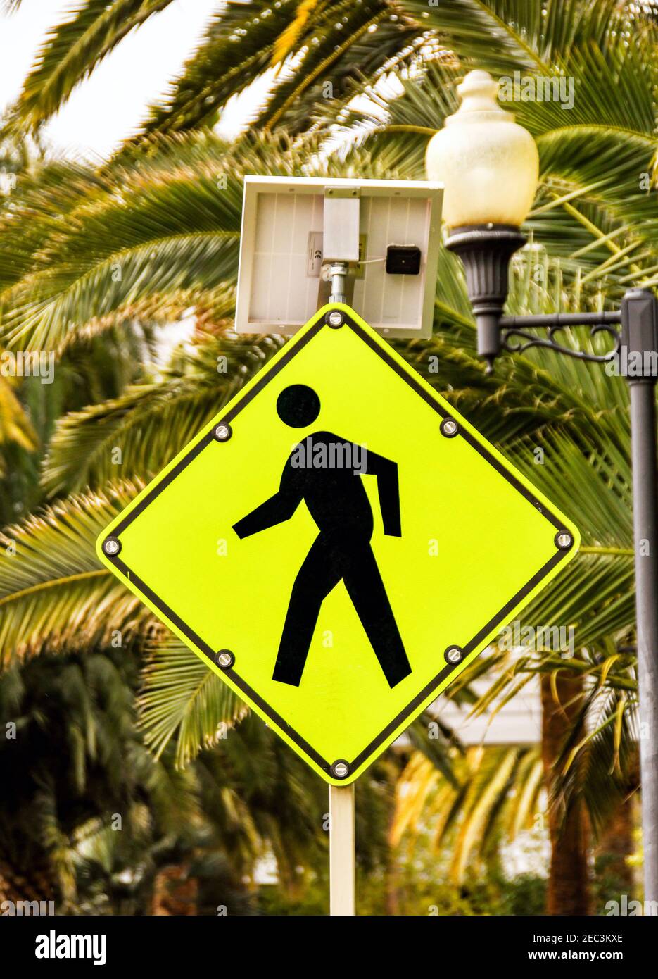 Sign in front of a hotel warning drivers of pedestrians crossing the ...