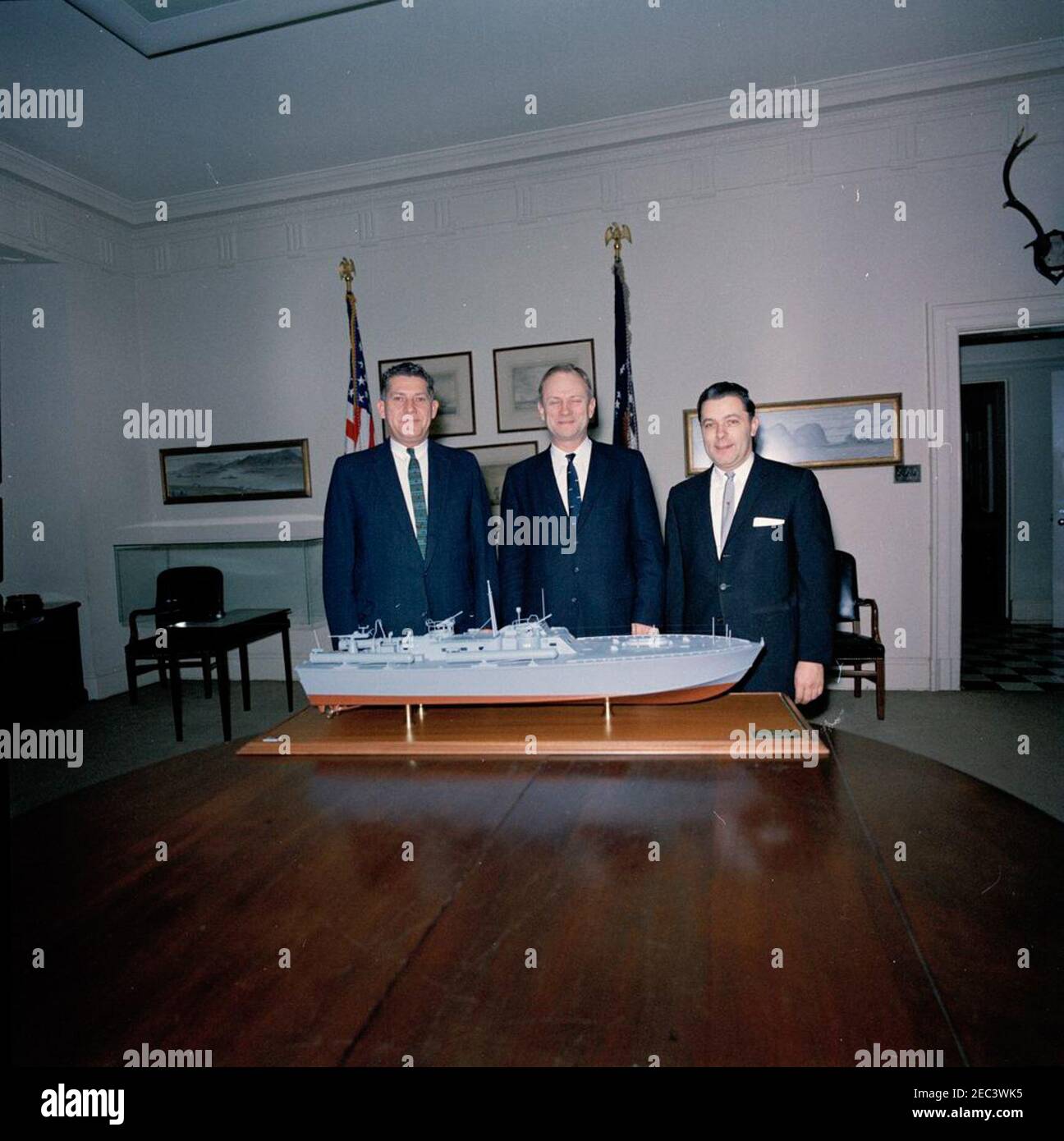 Presentation of a model PT boat for President Kennedy. Three ...