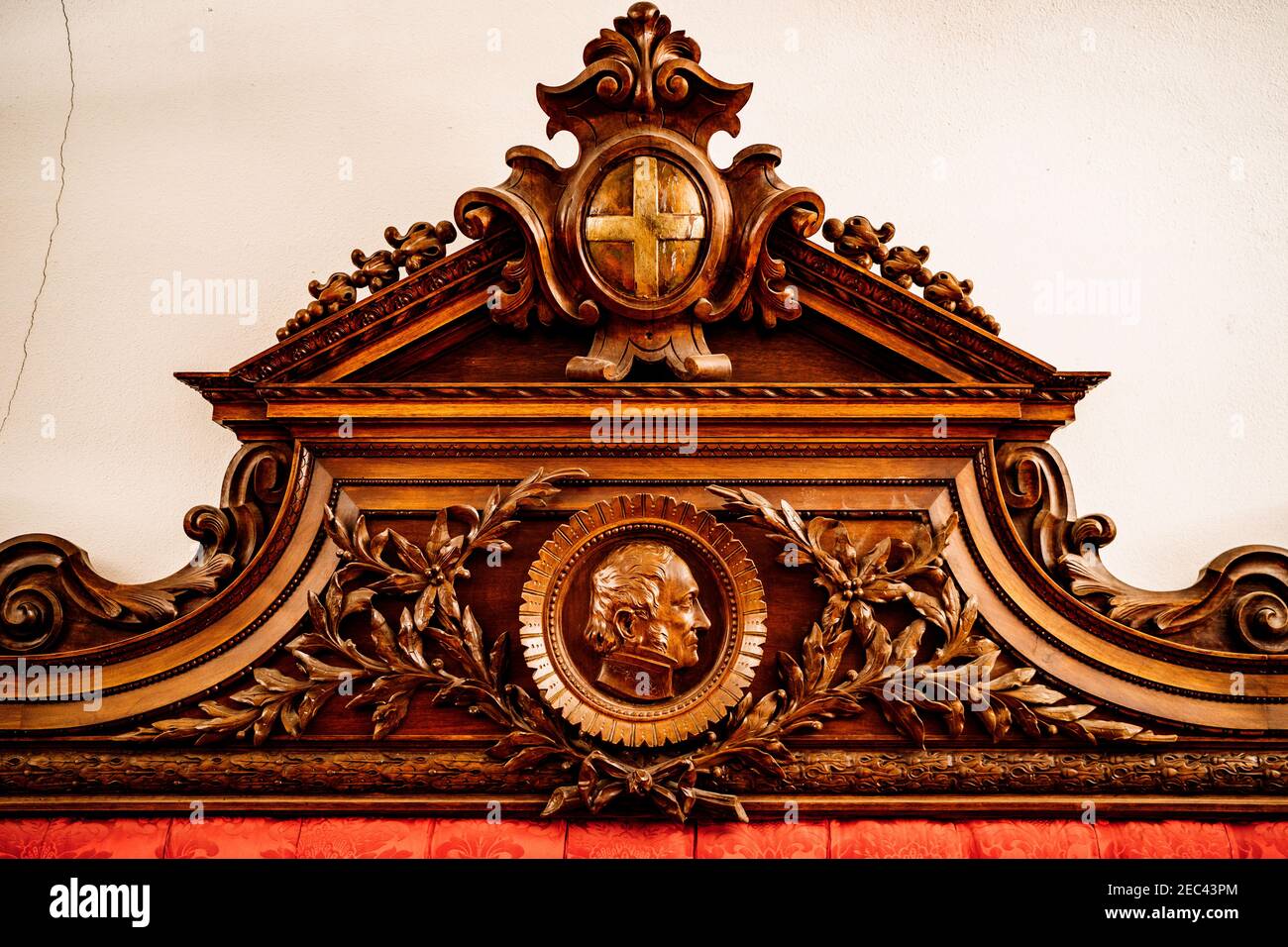 Carved wooden pommel with patterns, a cross and a man's face Stock ...