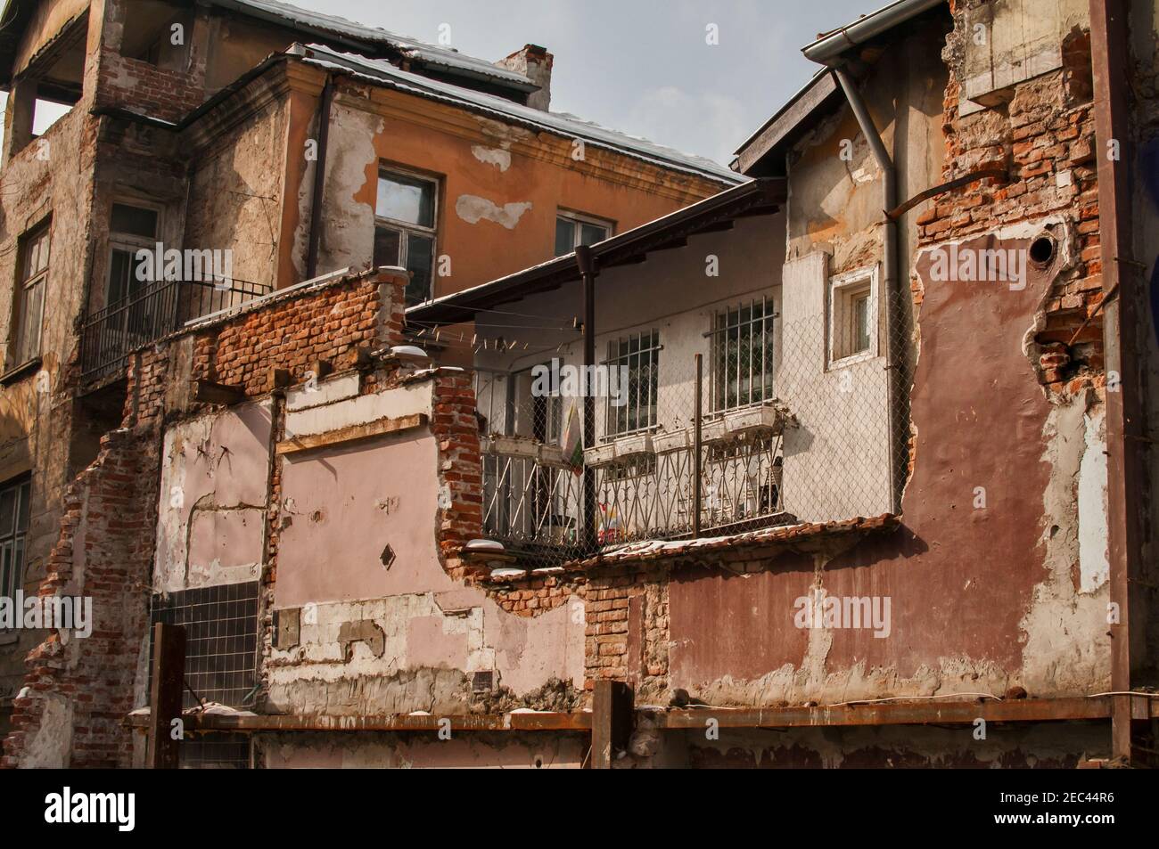 Grunge neglected destroyed city house back side Stock Photo - Alamy