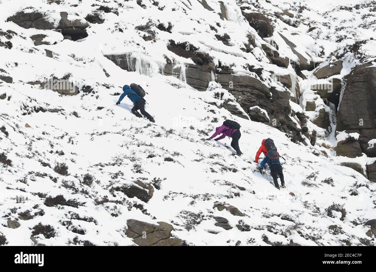 People ice climb on the frozen Kinder Downfall, High Peak in Derbyshire ...