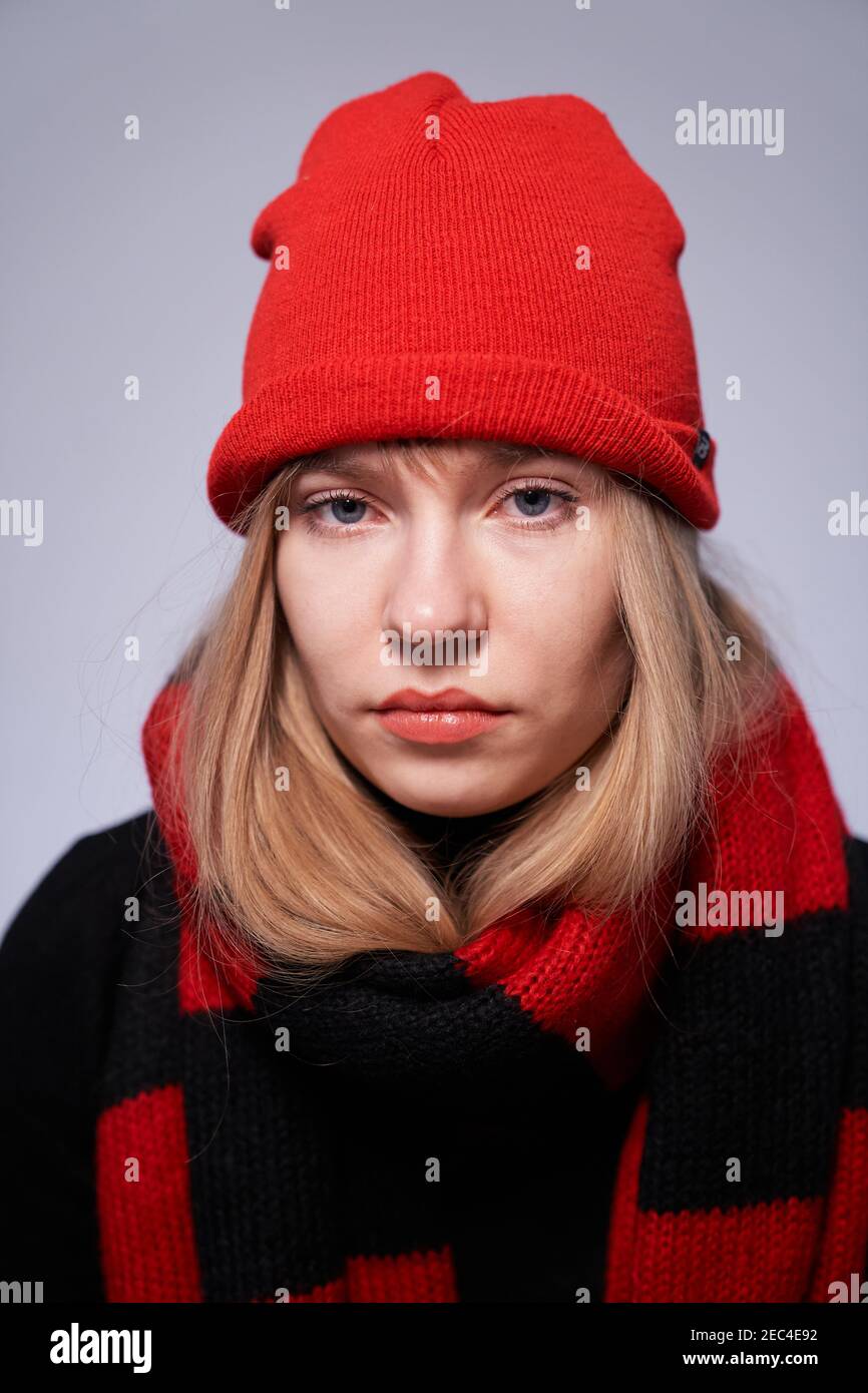 Blonde girl with long hair expressing neutral emotion. Pretty female ...