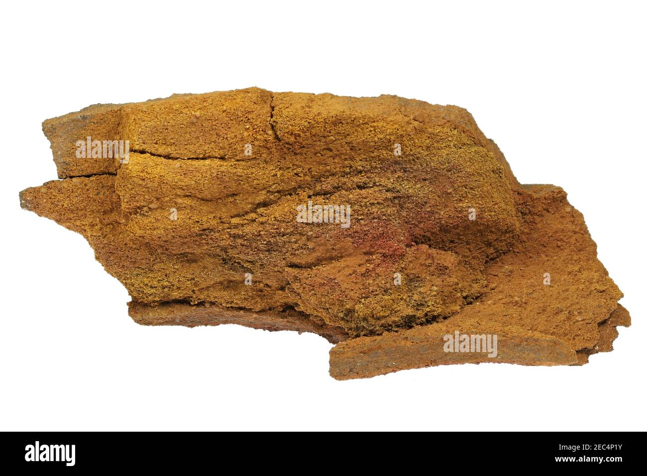 ochre sandstone from Roussillon, France isolated on white background ...