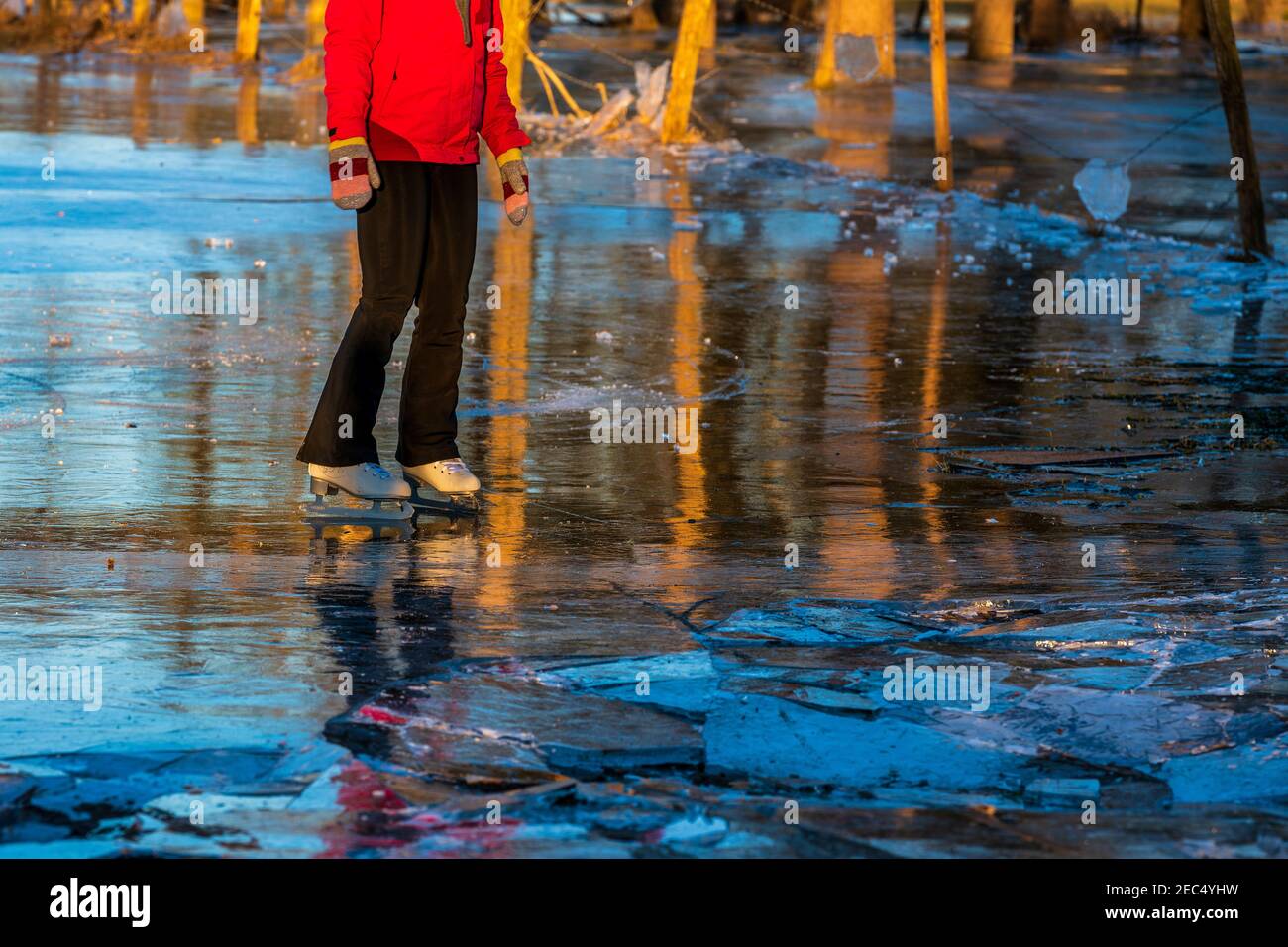 ice skaters on frozen field Stock Photo - Alamy