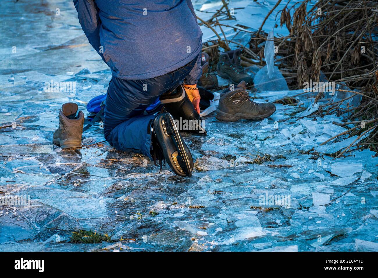 ice skaters on frozen field Stock Photo - Alamy