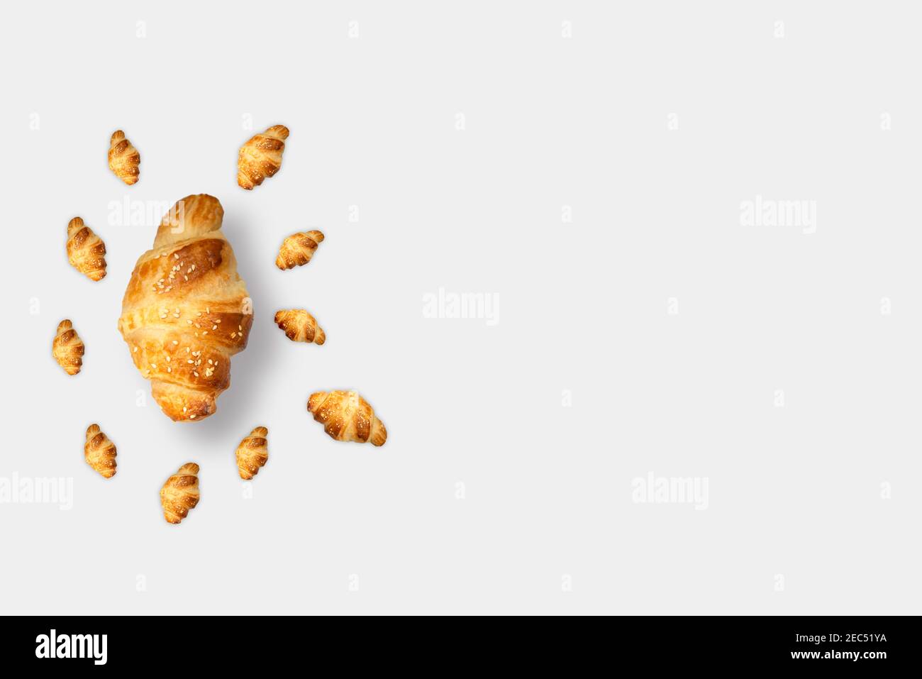 Many French croissant on a light background Stock Photo - Alamy