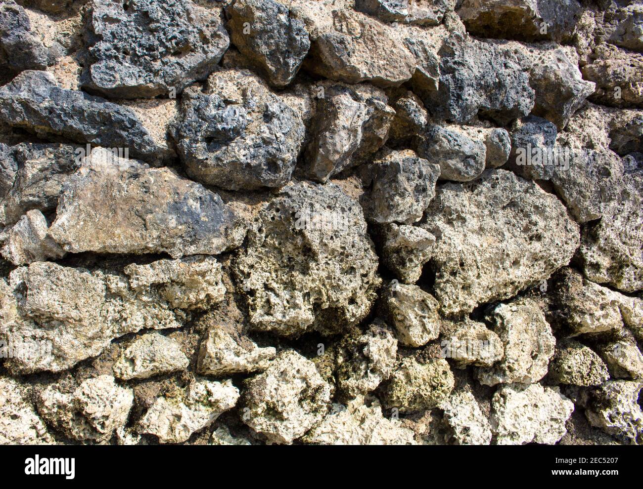 Natural stone background. Rustic old wall wallpaper. Rough grey stone ...