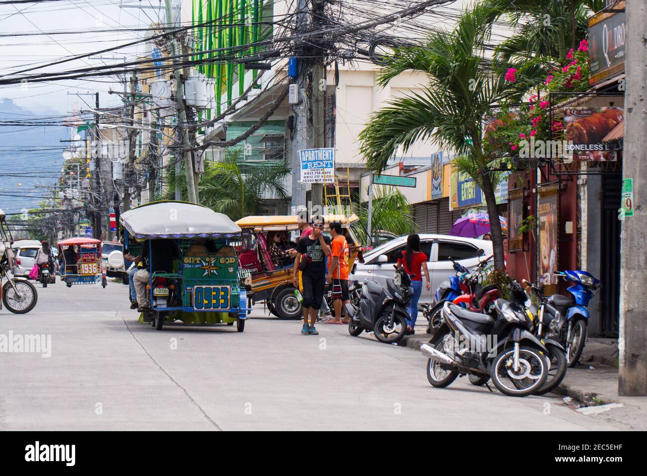 Dumaguete, Philippines: 13 May 2017: city street view with local ...