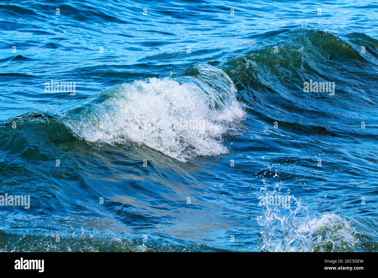 Seaside wave with foam. Sea wave swelling. Oceanic water during high ...