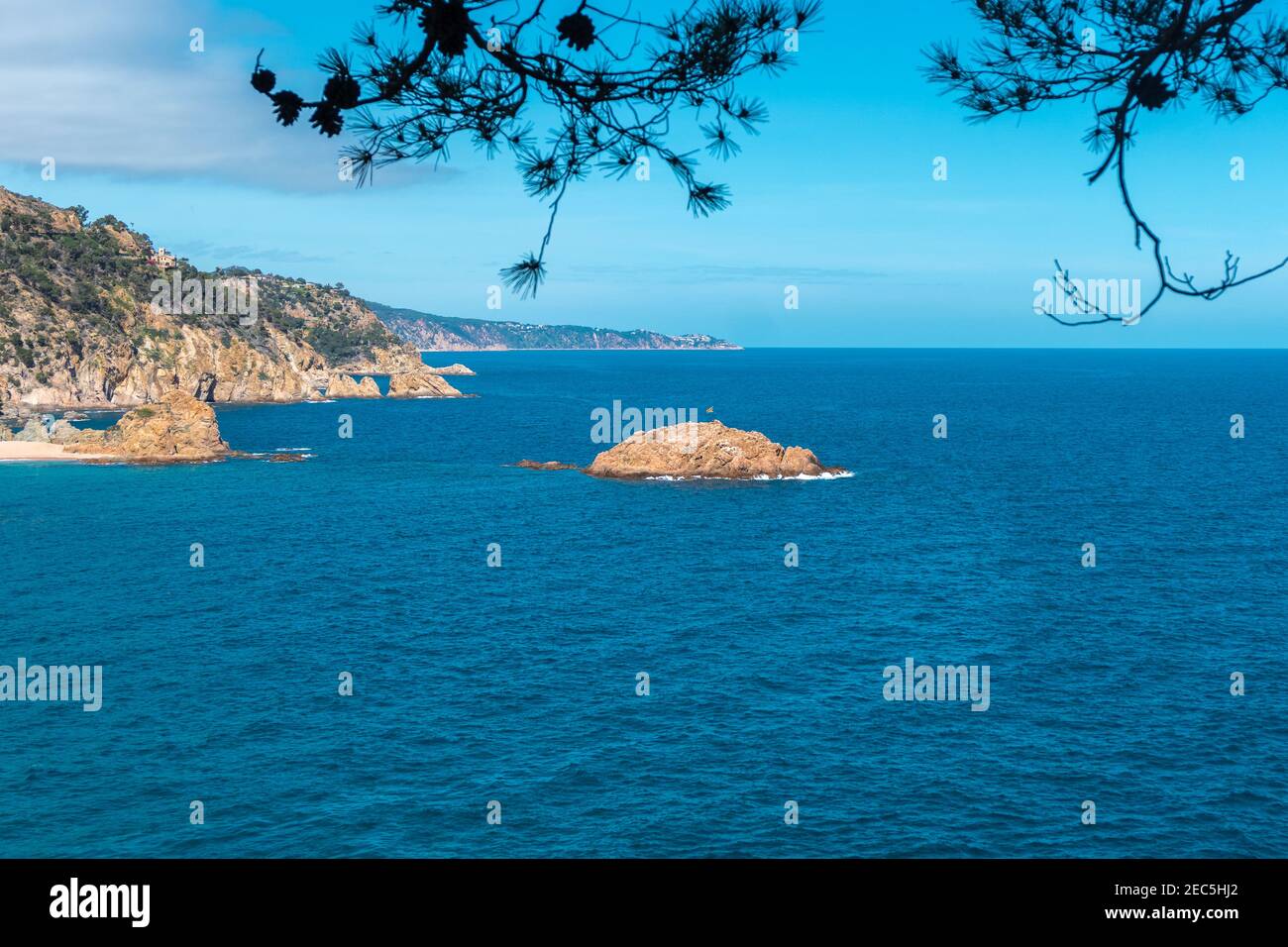 Typical beautiful Costa Brava coast surrounded by rocks and pine trees ...