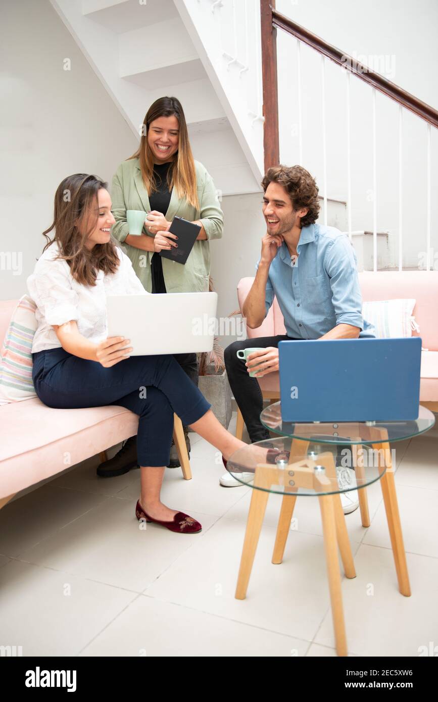 young people at work having a meeting informally Stock Photo - Alamy