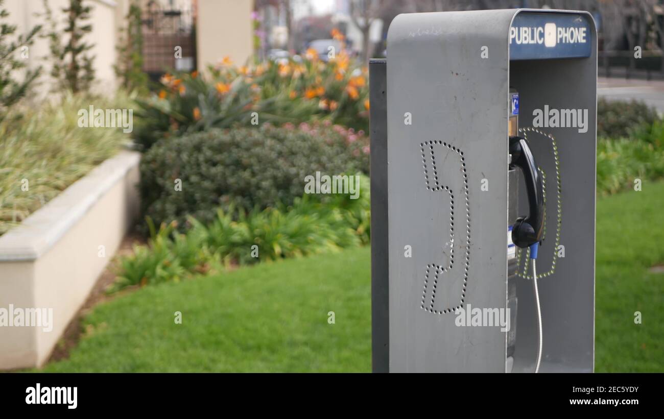 Retro coin-operated payphone station for emergency call on street ...