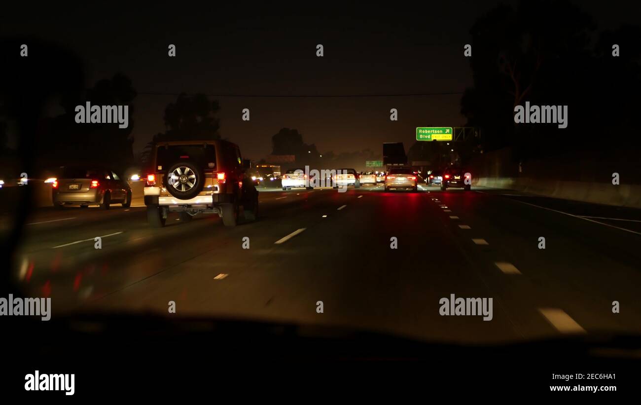 View from the car. Los Angeles busy freeway at night time. Massive ...