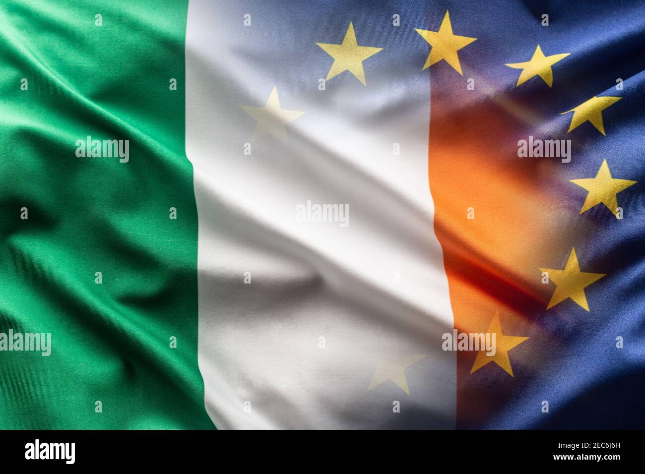 Flags of Ireland and EU blowing in the wind Stock Photo - Alamy