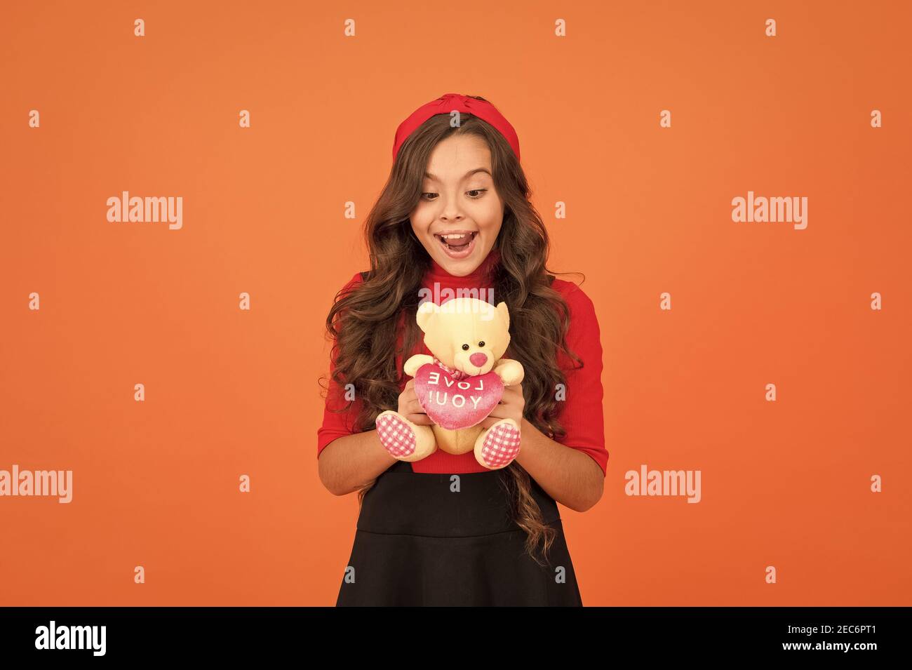 Little girl play with soft toy teddy bear. Child care. Childhood ...