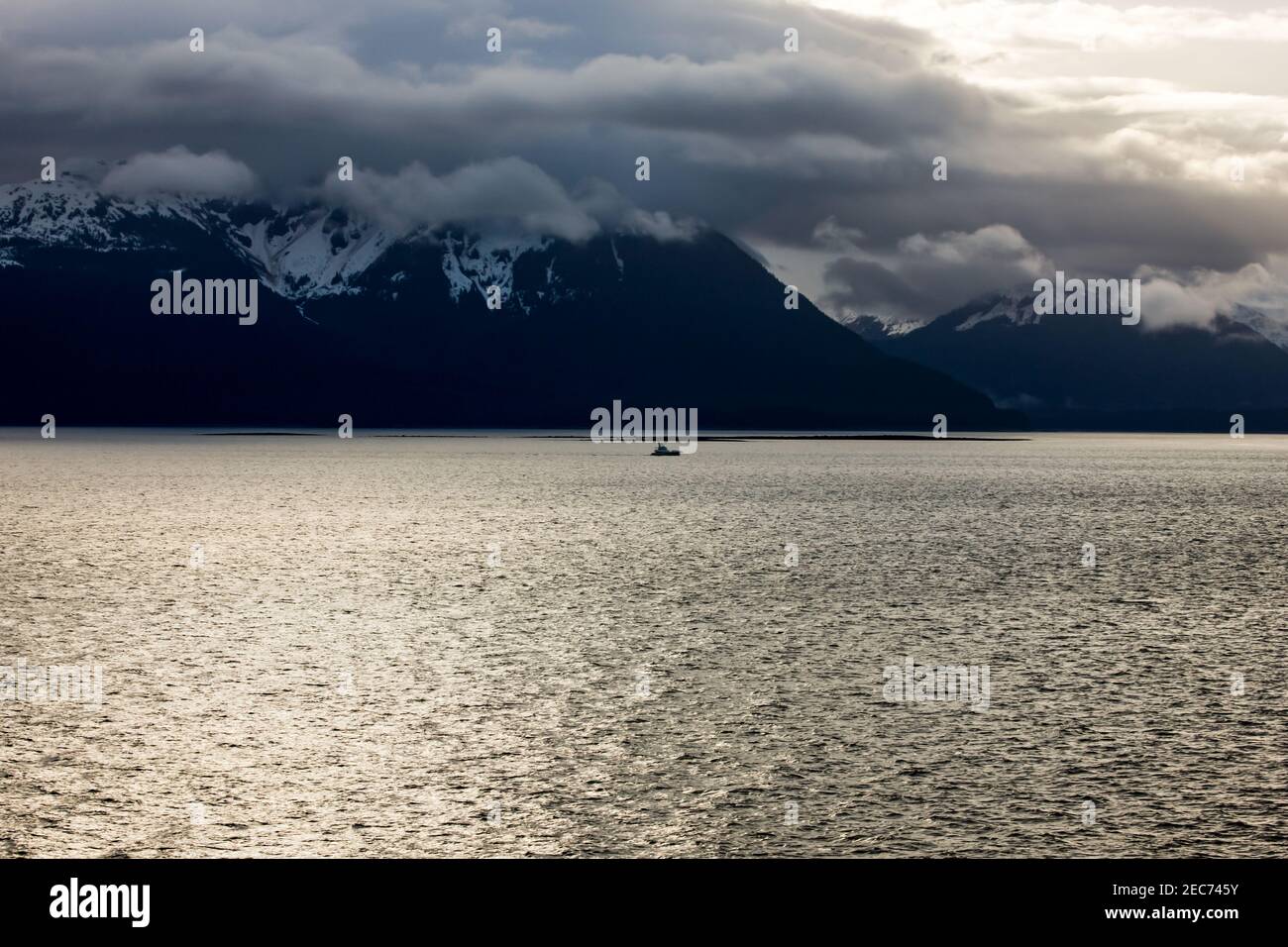 Scenic ocean view with low peaks in back Stock Photo - Alamy