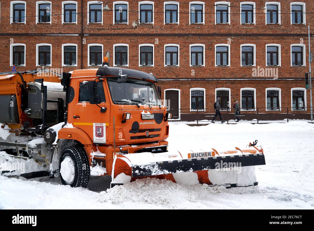 Moscow, Russia. 13th Feb, 2021. A snowplow truck removes snow from the ...