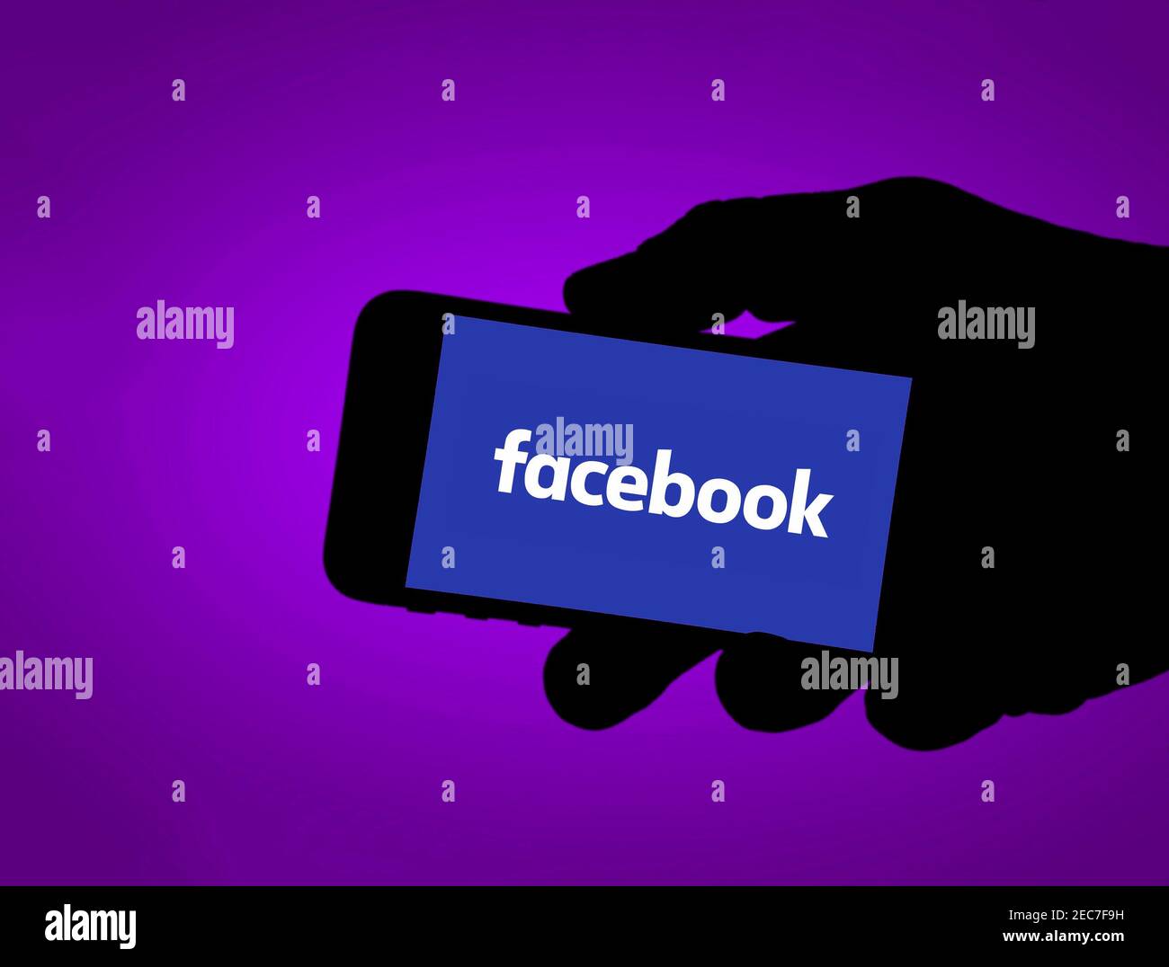 Facebook logo on mobile device Stock Photo - Alamy