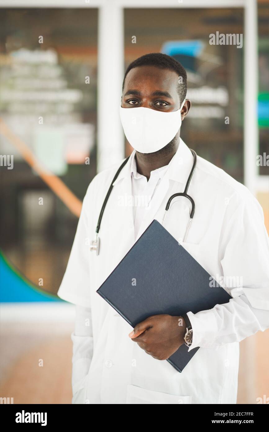 African doctor wear face mask with stethoscope Stock Photo - Alamy