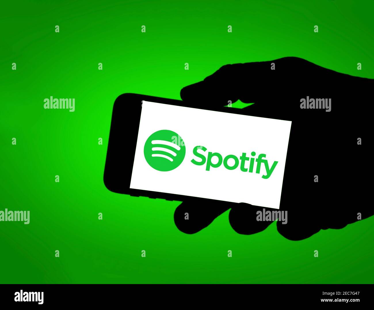 Spotify logo on mobile device Stock Photo - Alamy