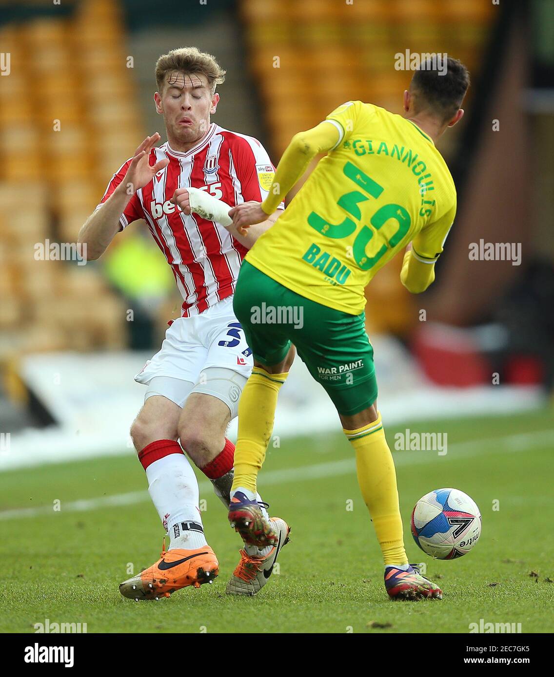 Stoke City's Nathan Collins (left) and Norwich City's Dimitris ...